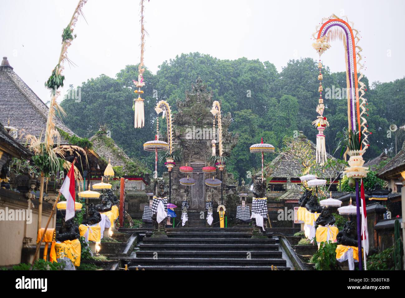 Front view of a Balinese temple gate with stone steps and traditional ...