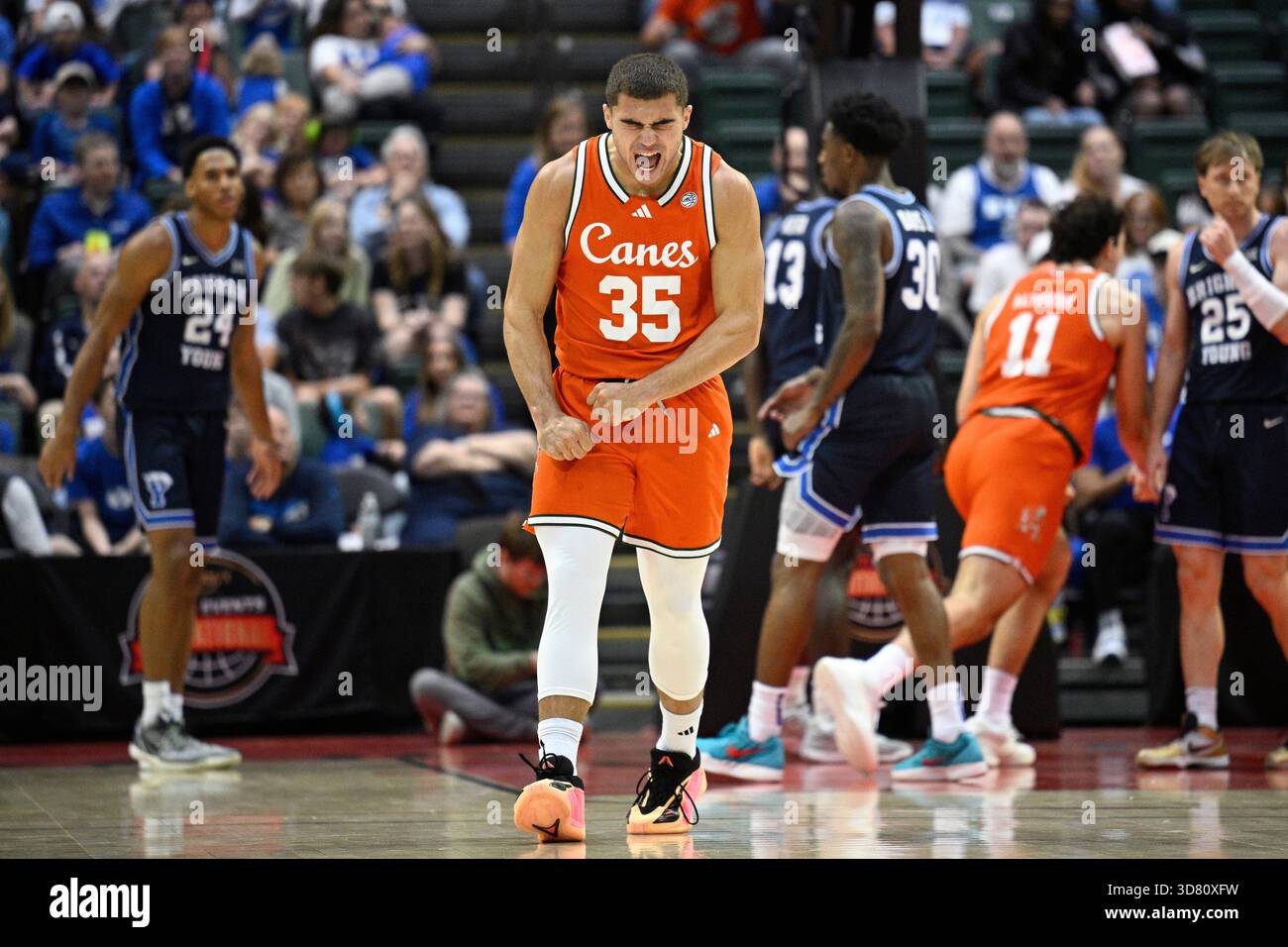 Miami guard Dante Allen (35) celebrates after a basket against BYU ...