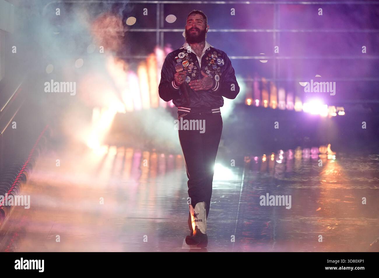 Post Malone performs during halftime of an NFL football game between ...