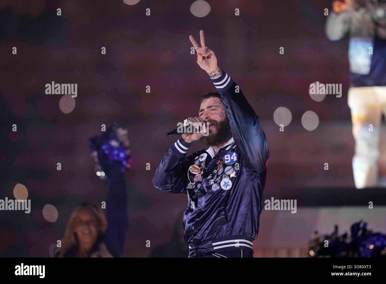 Post Malone performs during halftime of an NFL football game between ...