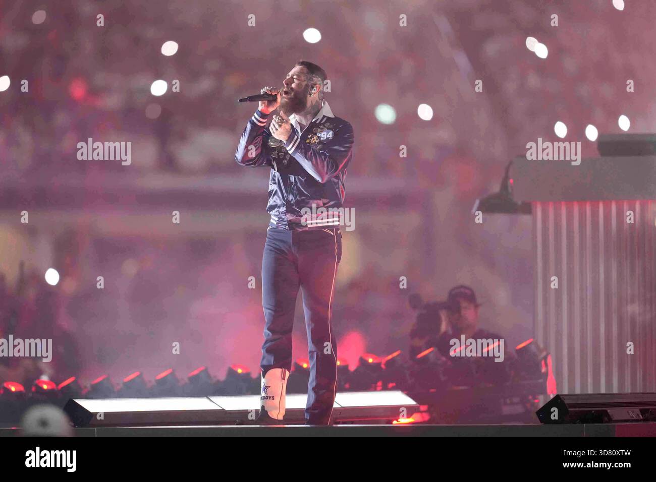 Post Malone performs during halftime of an NFL football game between ...