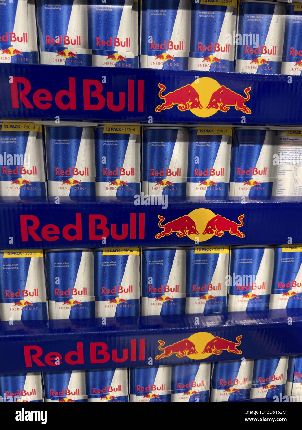 Red Bull soft drink in stacked aluminum cans aluminum cans at retail ...