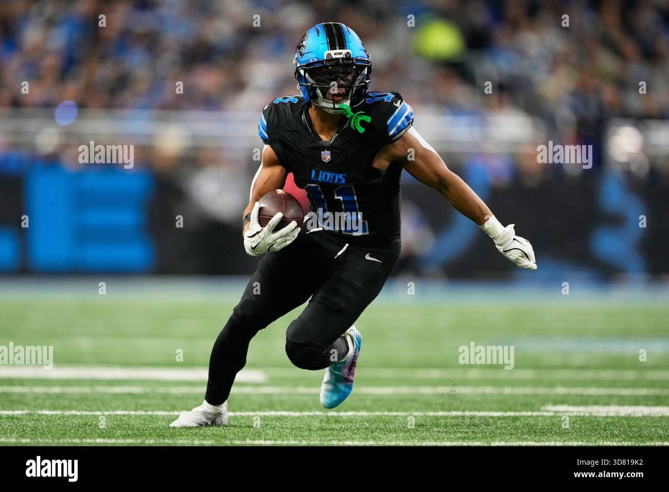Detroit Lions wide receiver Kalif Raymond runs during an NFL football ...