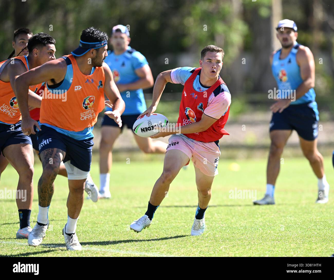 Zane Harrison (centre) in action during a Gold Coast Titans NRL ...