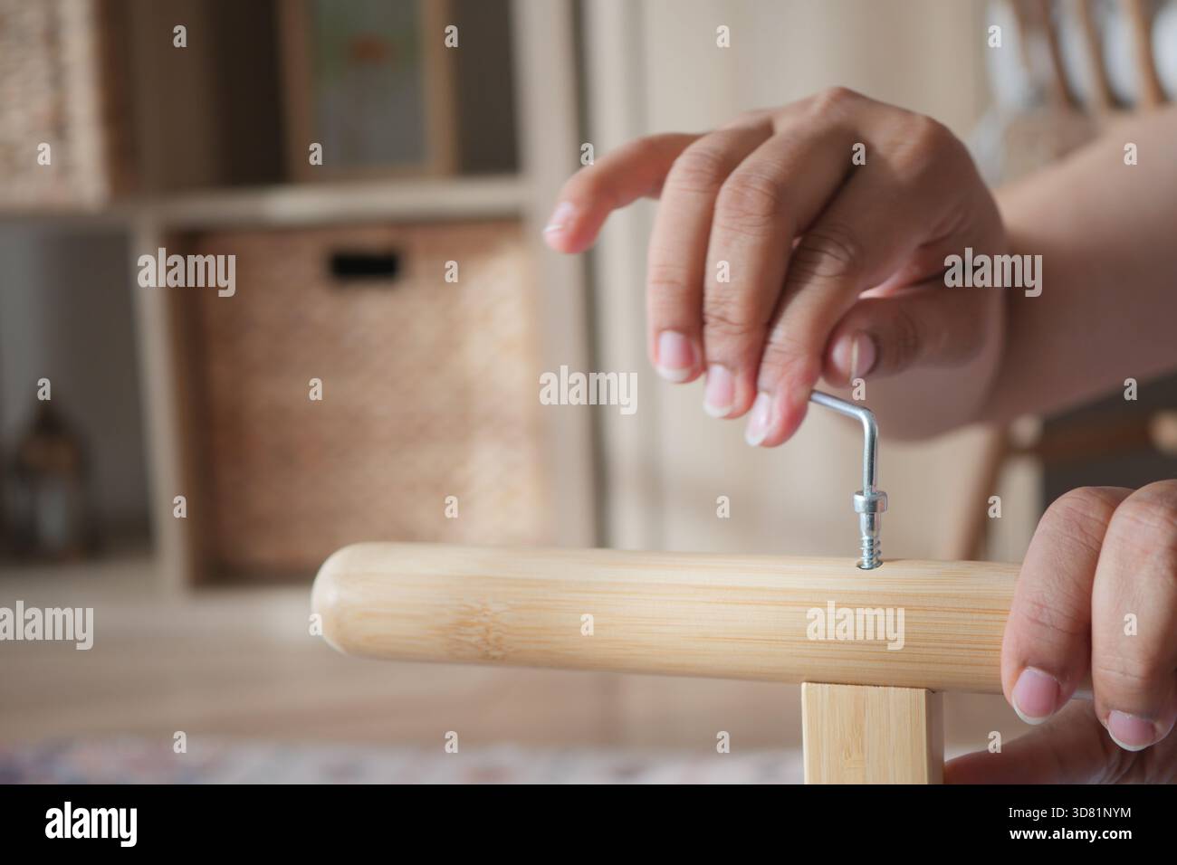 Building a wooden furniture piece using a screw and tool Stock Photo ...