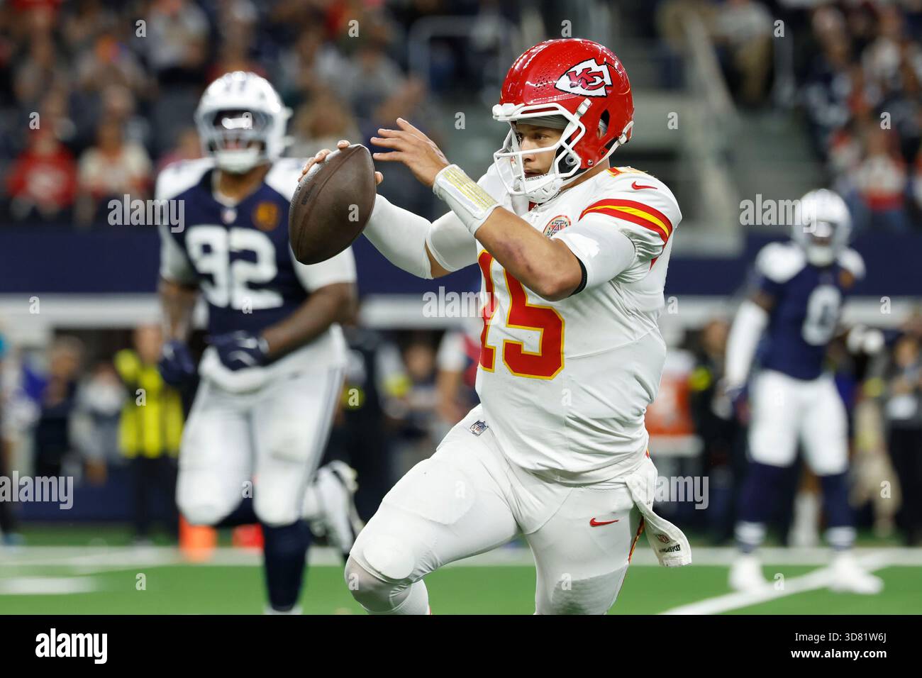 Kansas City Chiefs quarterback Patrick Mahomes (15) carries the ball on ...