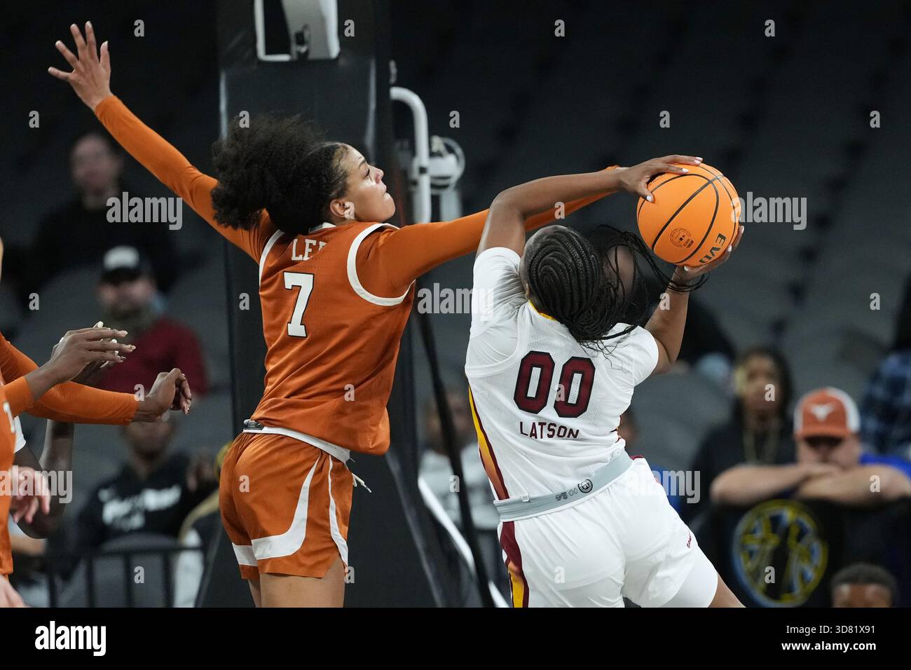 South Carolina guard Ta'Niya Latson (00) is blocked by Texas guard ...