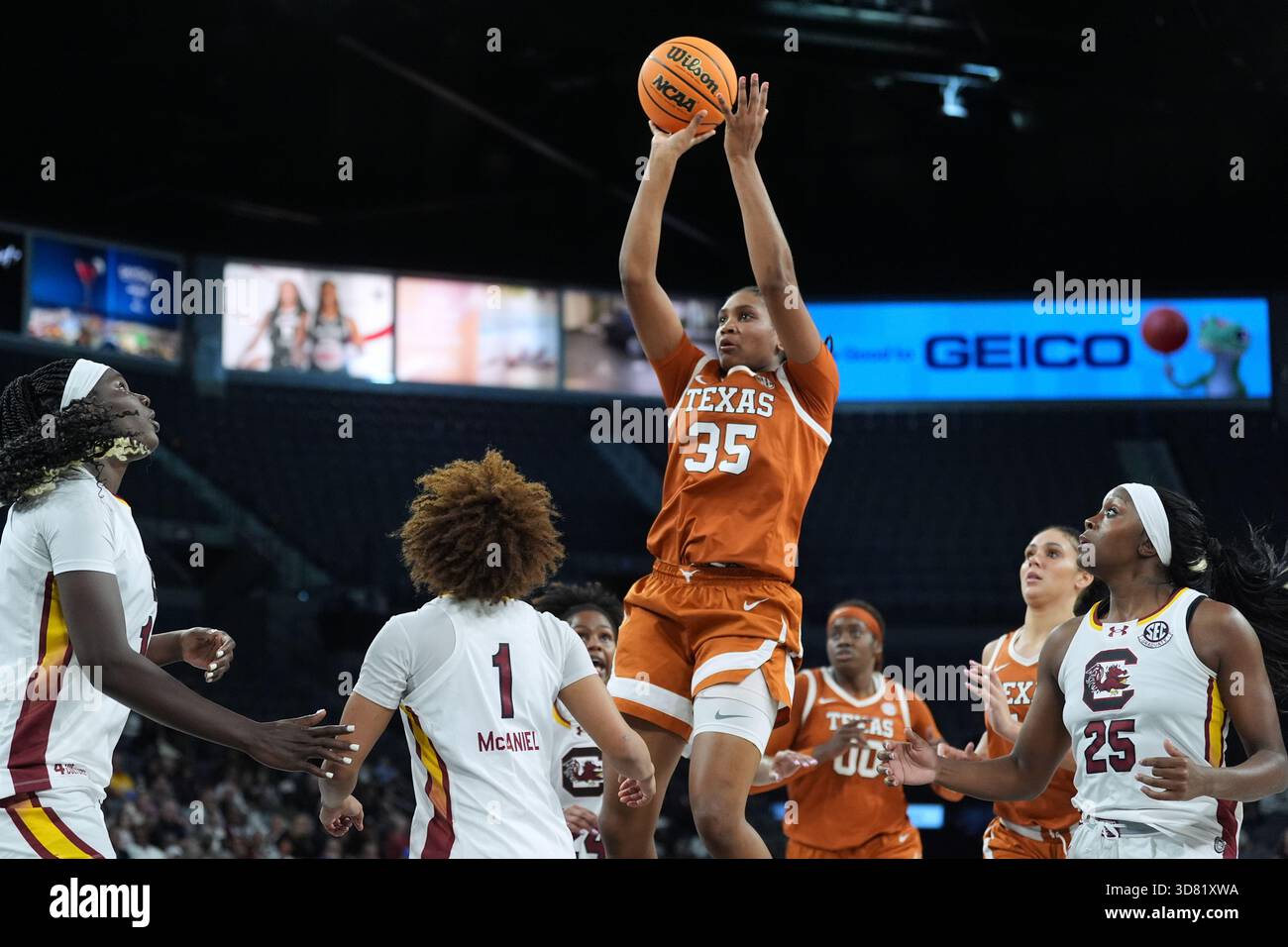 Texas forward Madison Booker (35) shoots over South Carolina guard ...