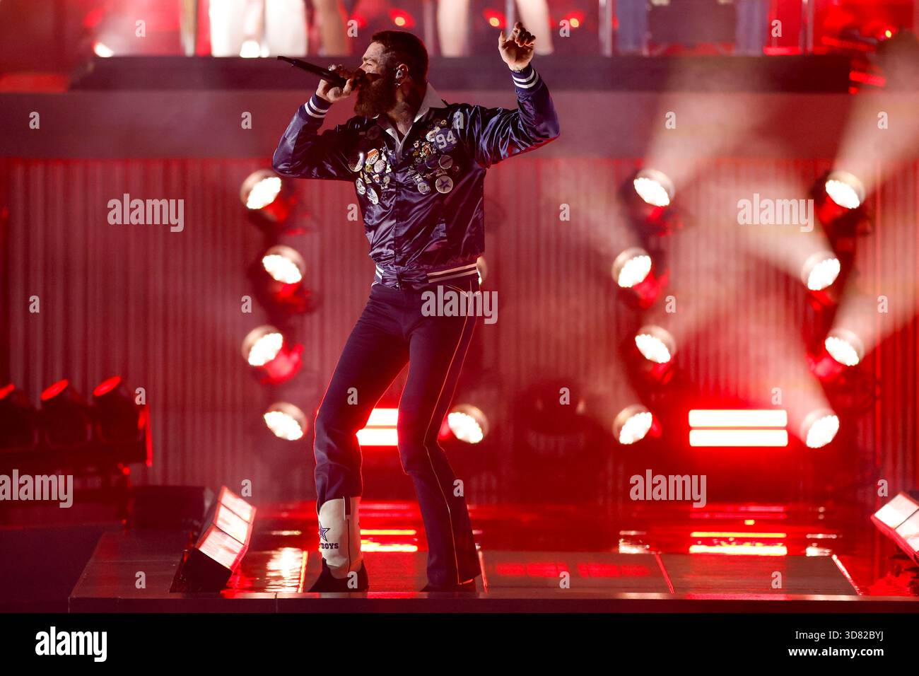 Post Malone performs during halftime of an NFL football game between ...
