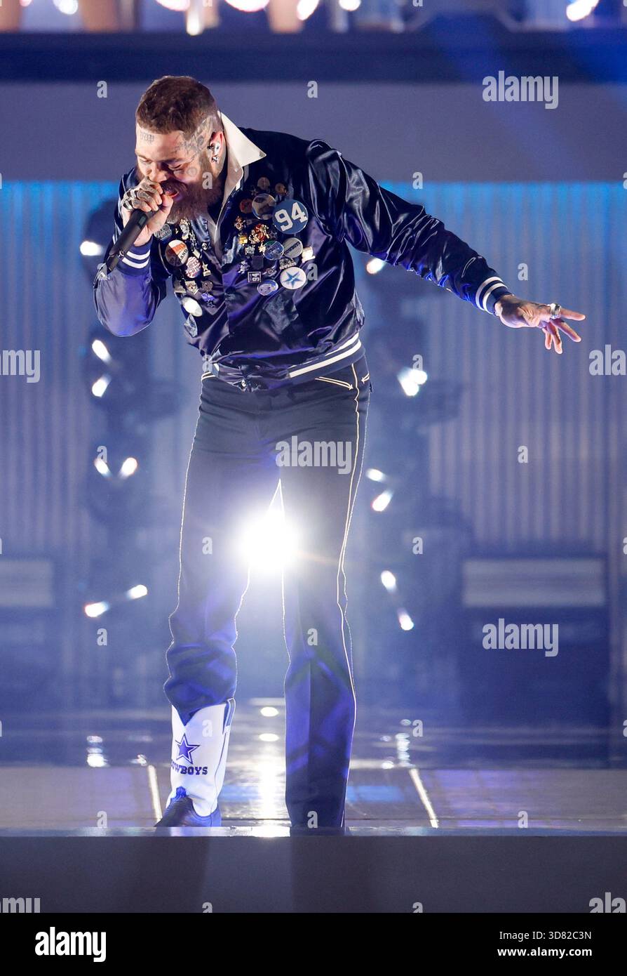 Post Malone performs during halftime of an NFL football game between ...