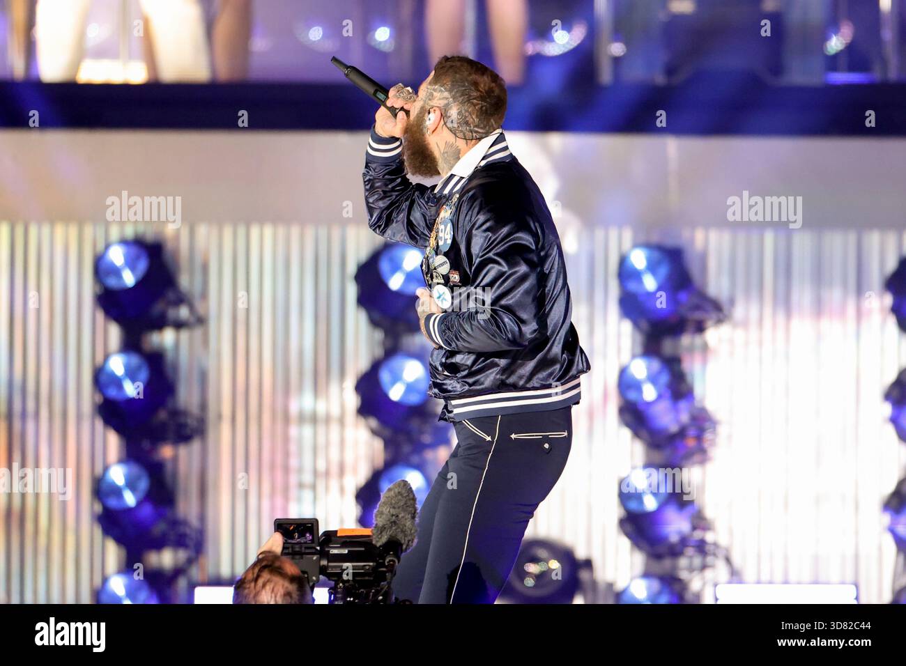 Post Malone performs during halftime of an NFL football game between ...