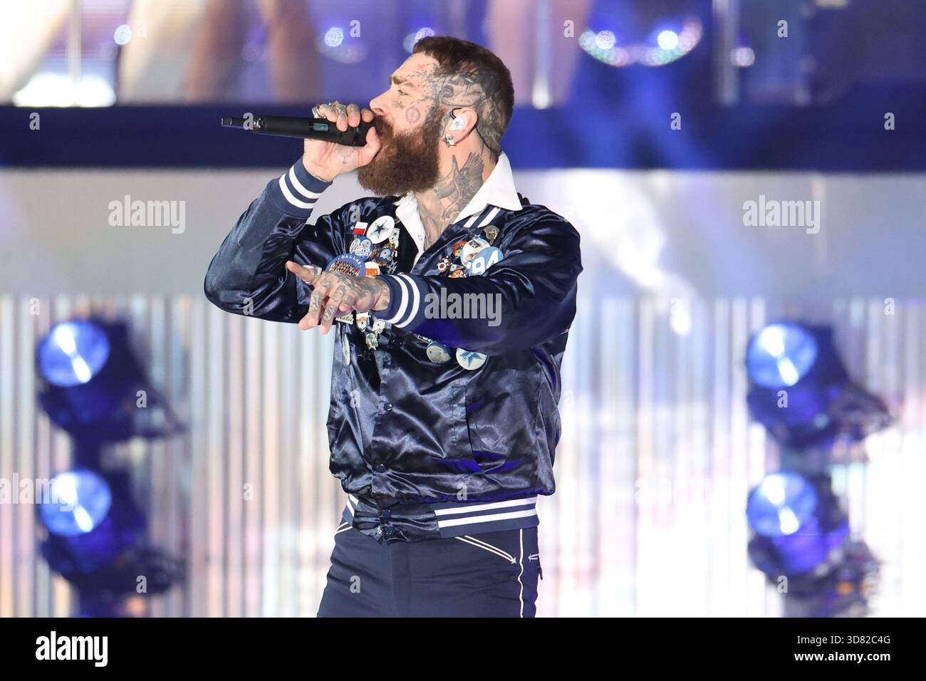 Post Malone performs during halftime of an NFL football game between ...