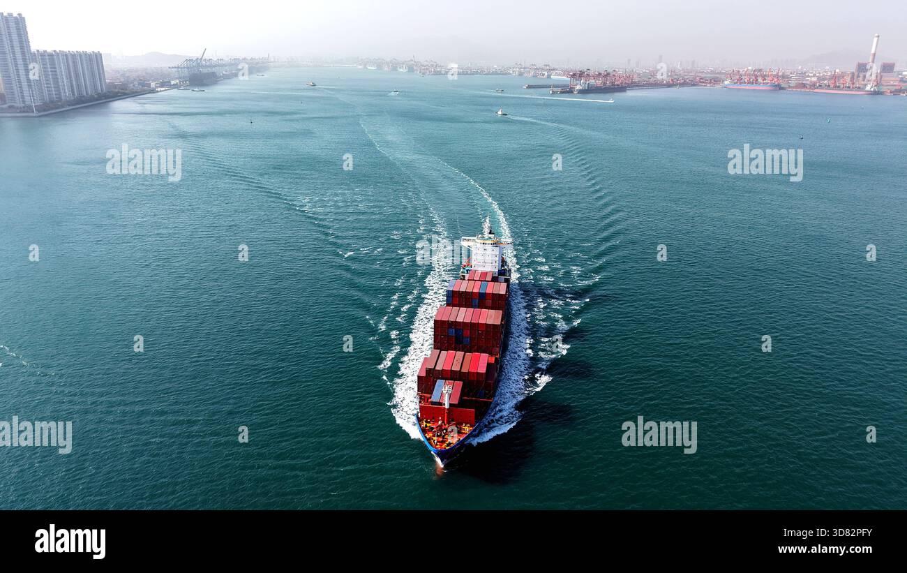 QINGDAO, CHINA - NOVEMBER 28, 2025 - A cargo ship loaded with ...