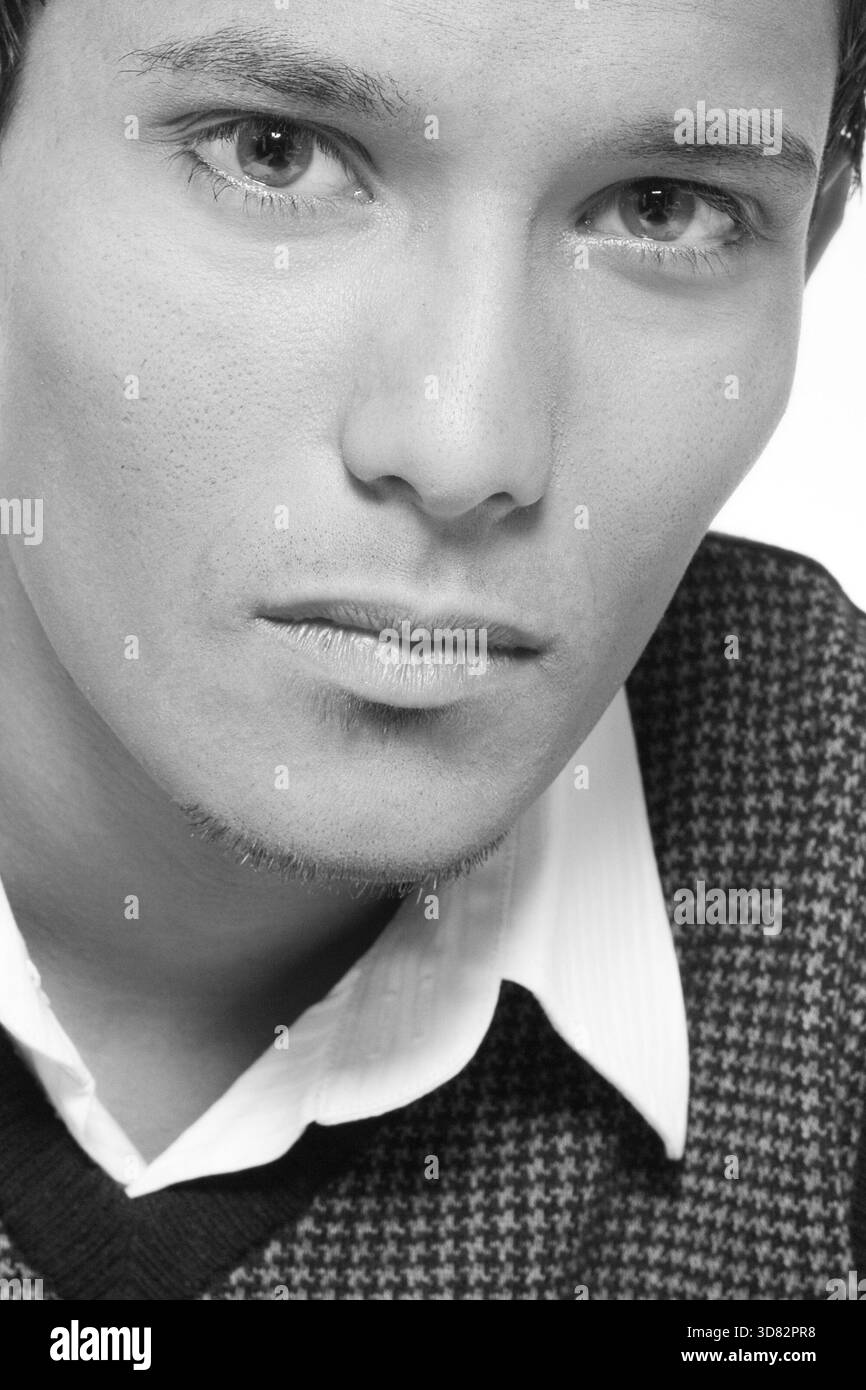 Young adult male short dark Black and White Stock Photos & Images - Alamy