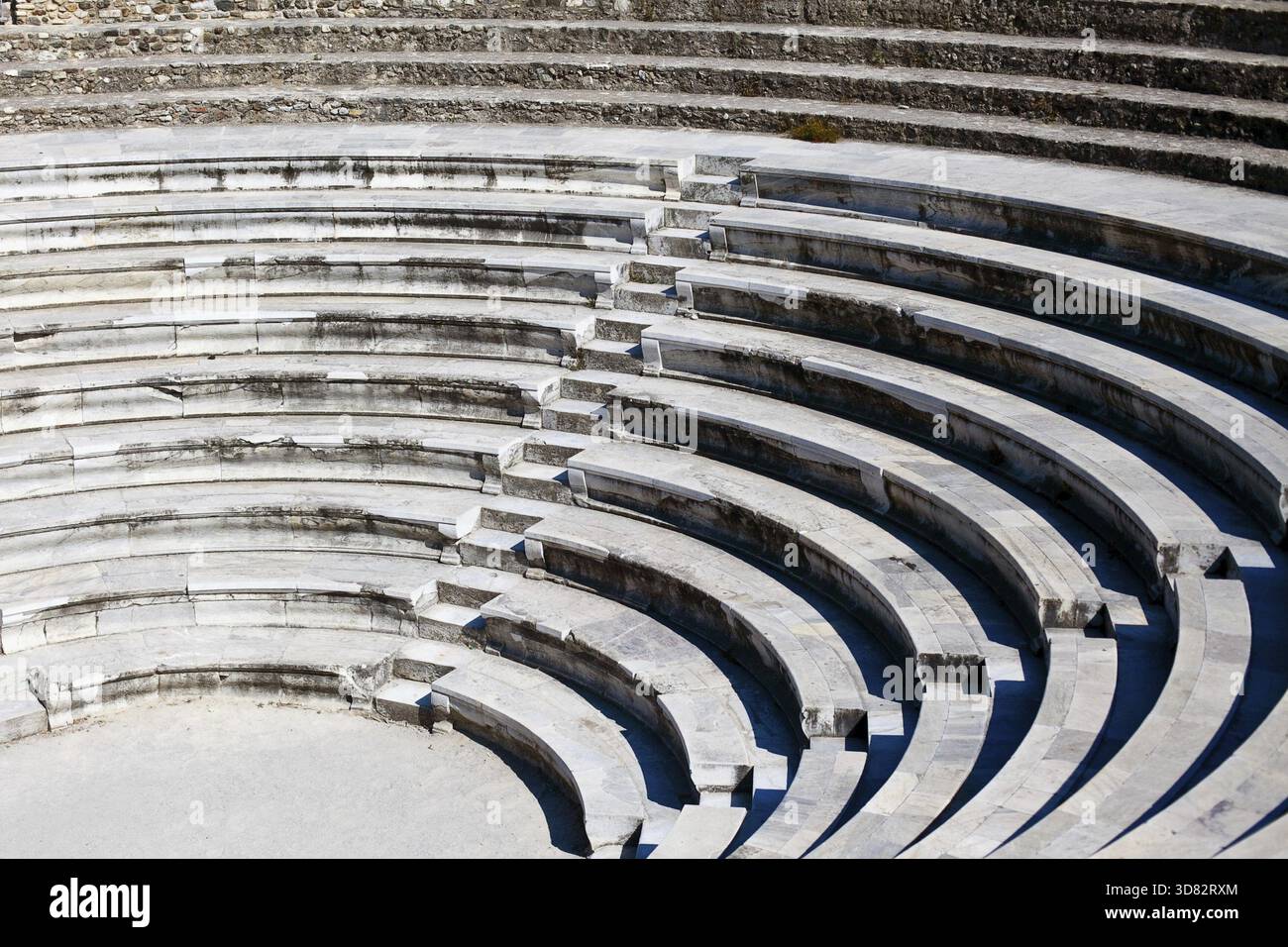 Old curved stairs of ancient greek amphitheatre Stock Photo - Alamy