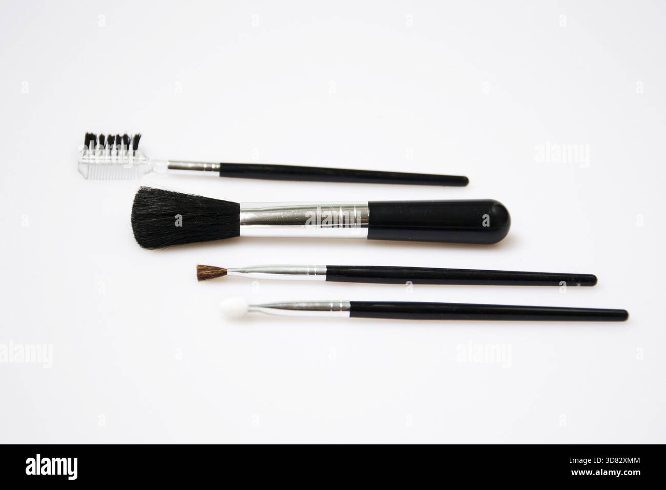 Female painter different brushes hi-res stock photography and images ...