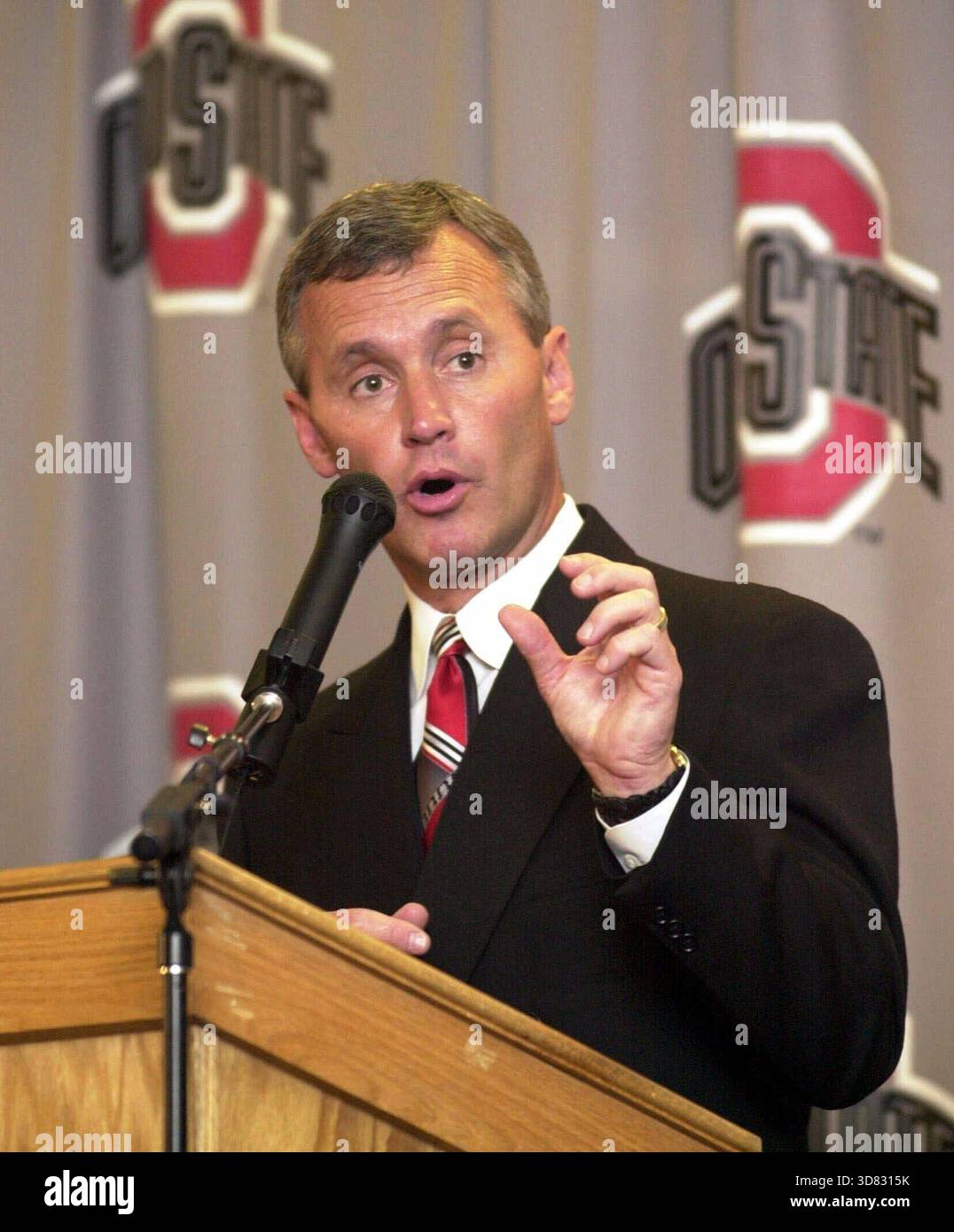 FILE - New Ohio State football coach Jim Tressel speaks to the media at ...