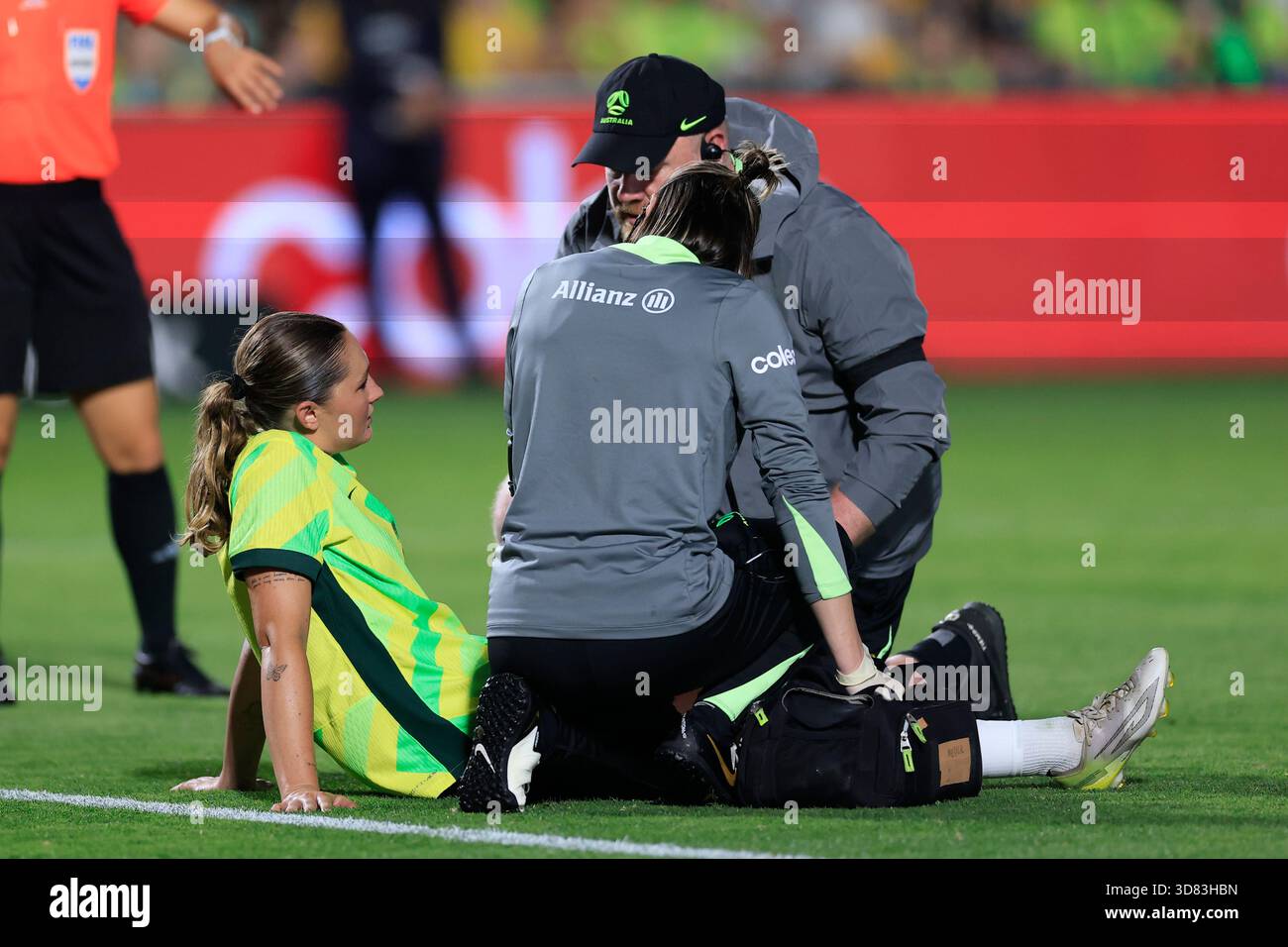 Winonah Heatley of the Matildas is treated during the International ...