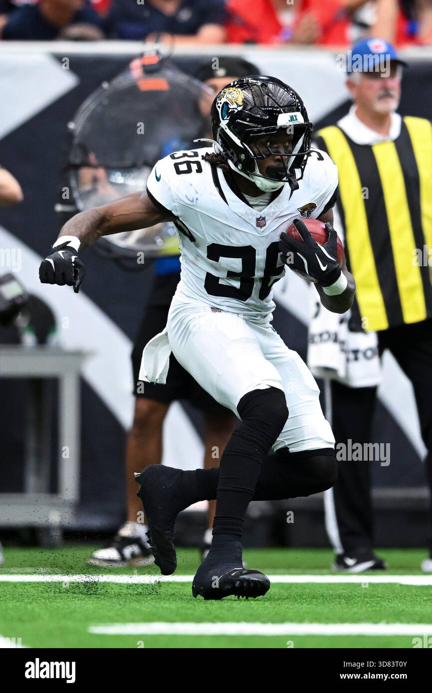 Jacksonville Jaguars running back LeQuint Allen Jr. (36) runs the ball ...