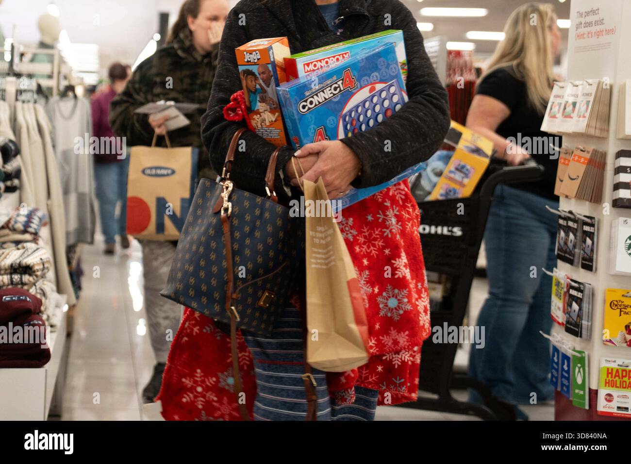 Shoppers browse through Kohl's department store for Black Friday deals ...