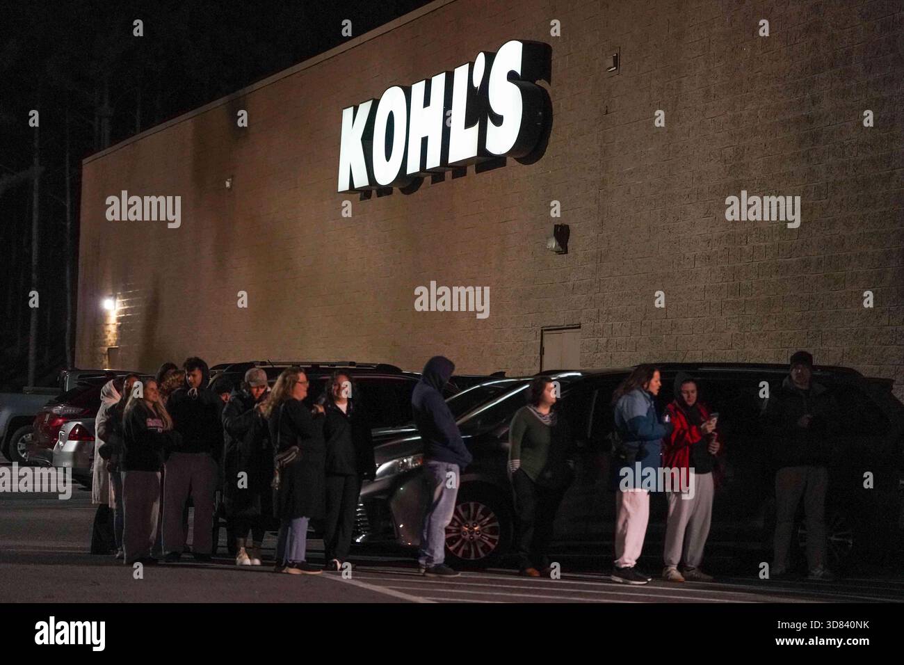 Shoppers stand in line to enter Kohl's department store for Black ...
