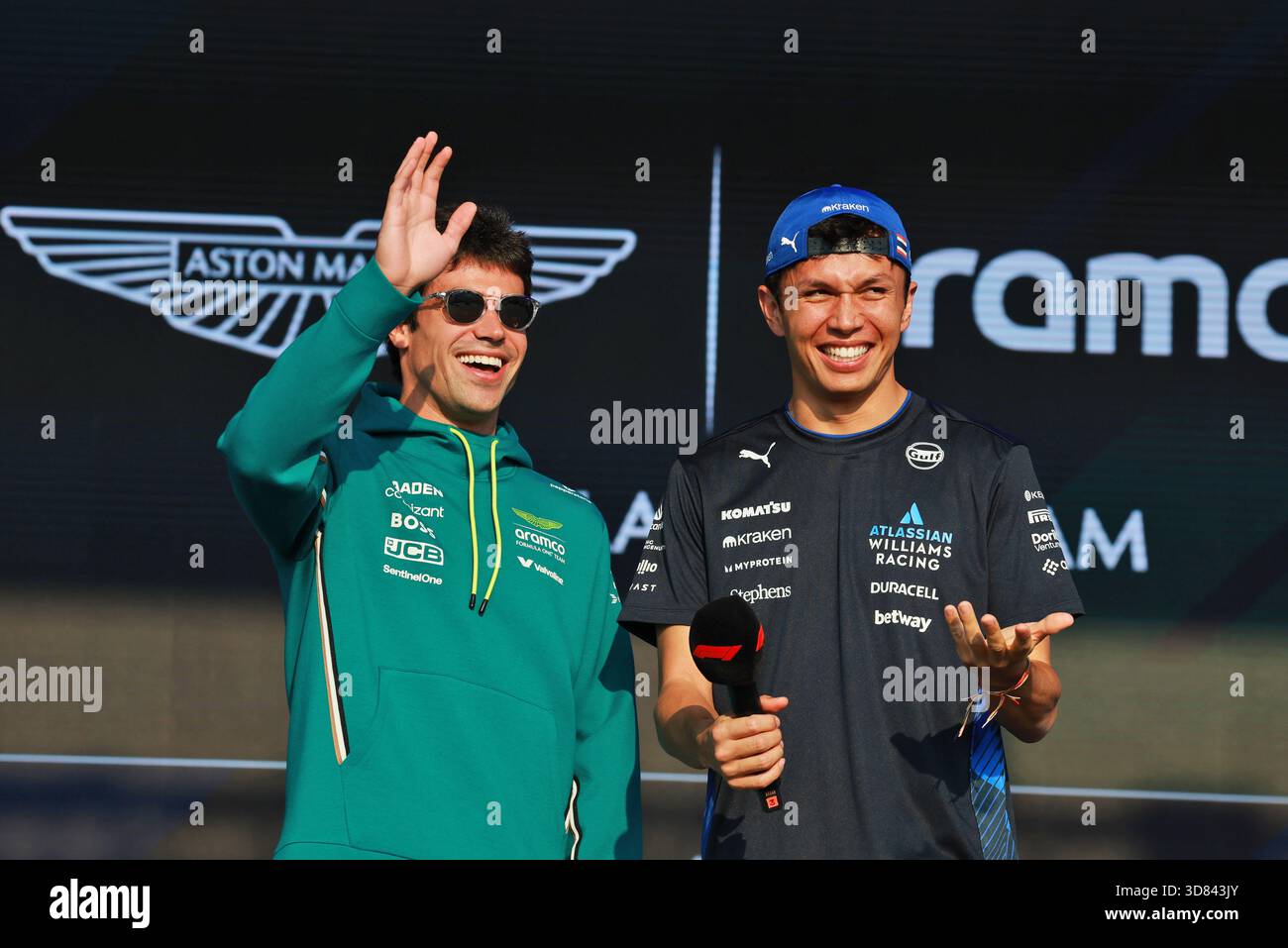 (L to R): Lance Stroll (CDN) Aston Martin F1 Team and Alexander Albon ...
