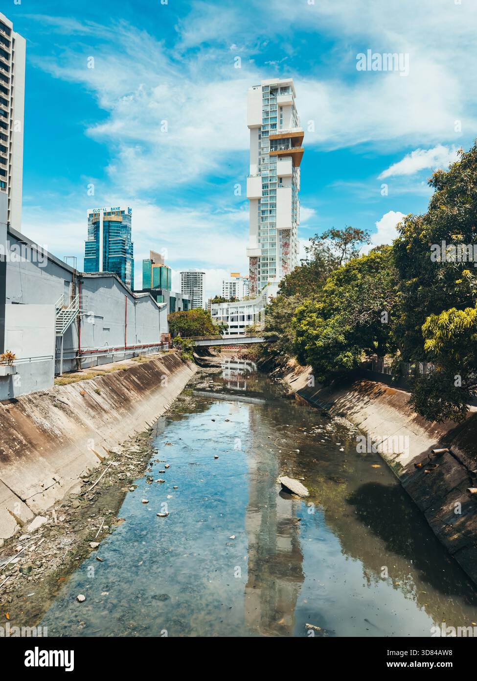 Urban canal in Panama City with modern high-rises, including the iconic ...