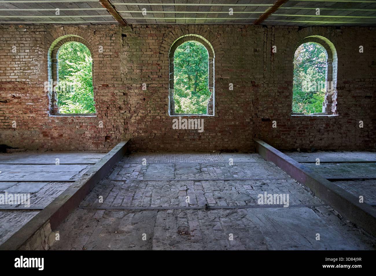 An empty room with windows in a ruined, historic palace in the village ...
