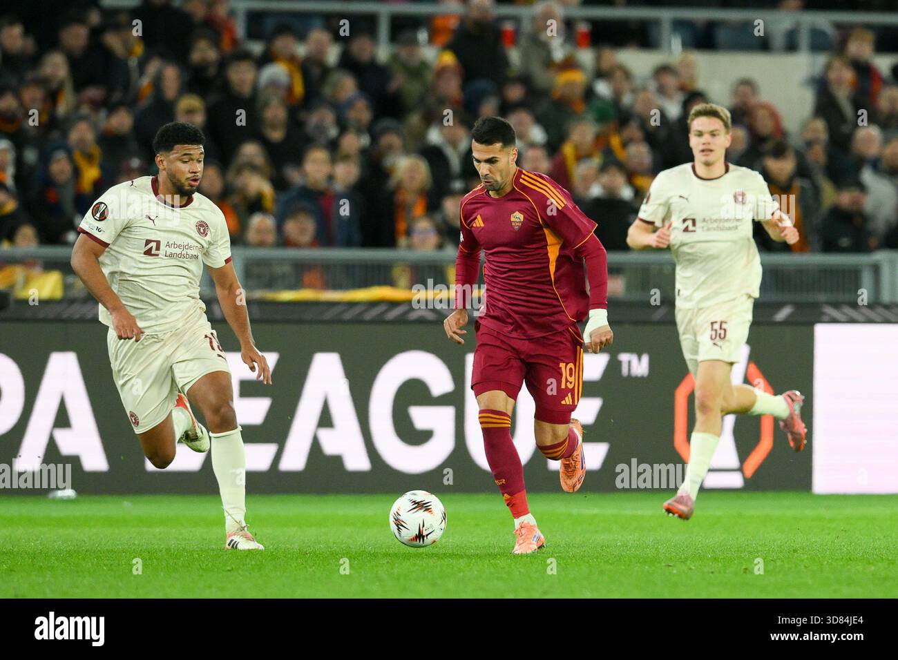 Zeki celik of as roma runs with the ball hi-res stock photography and ...