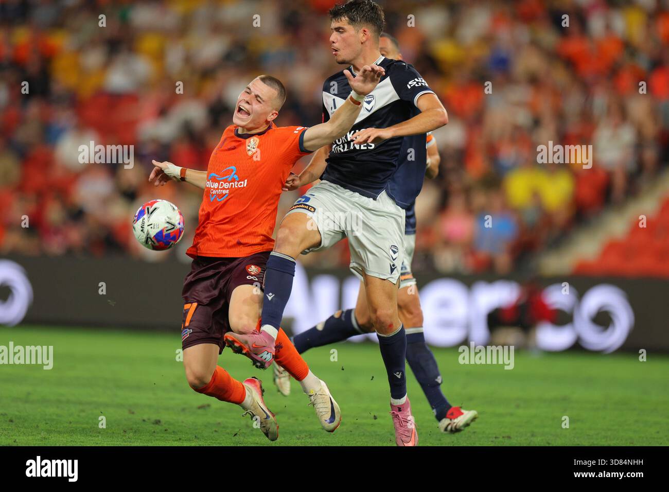 Justin Vidic (17 Brisbane) is tackled by Sebastian Esposito (16 ...