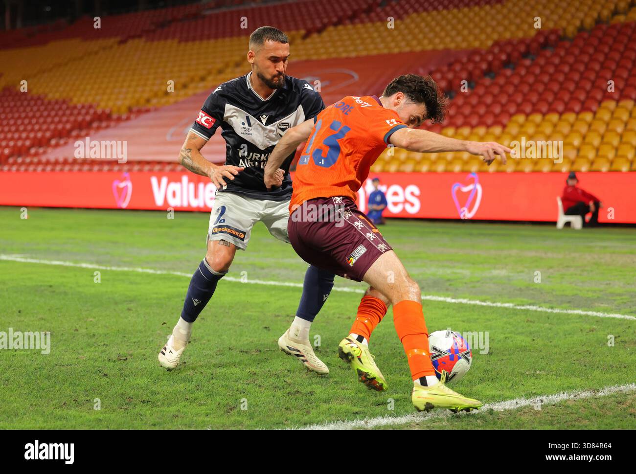 Jason Davidson (2 Melbourne) and Henry Hore (13 Brisbane) challenge for ...