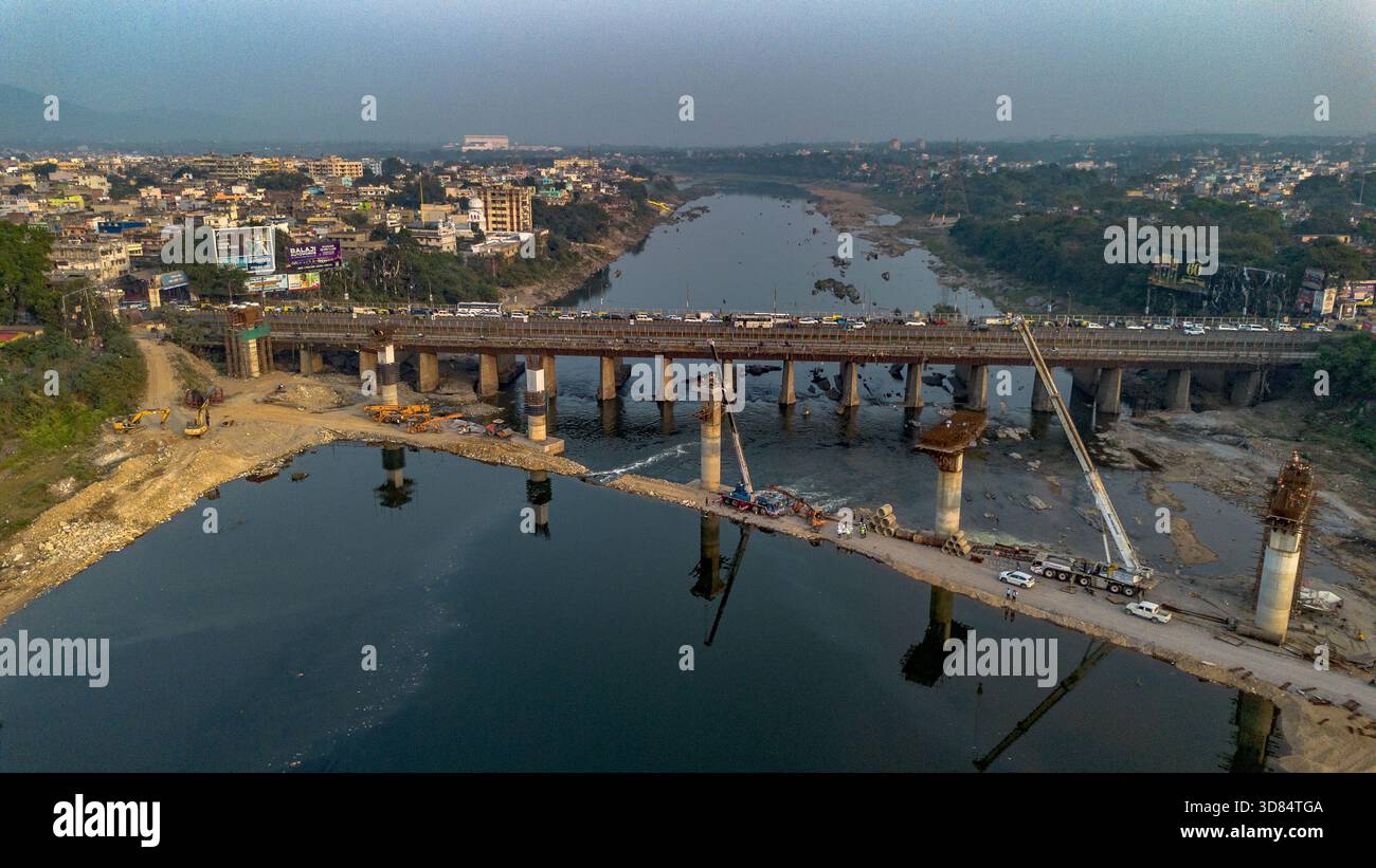 General view of the Subarnarekha River bridge under construction, showing ongoing structural ...