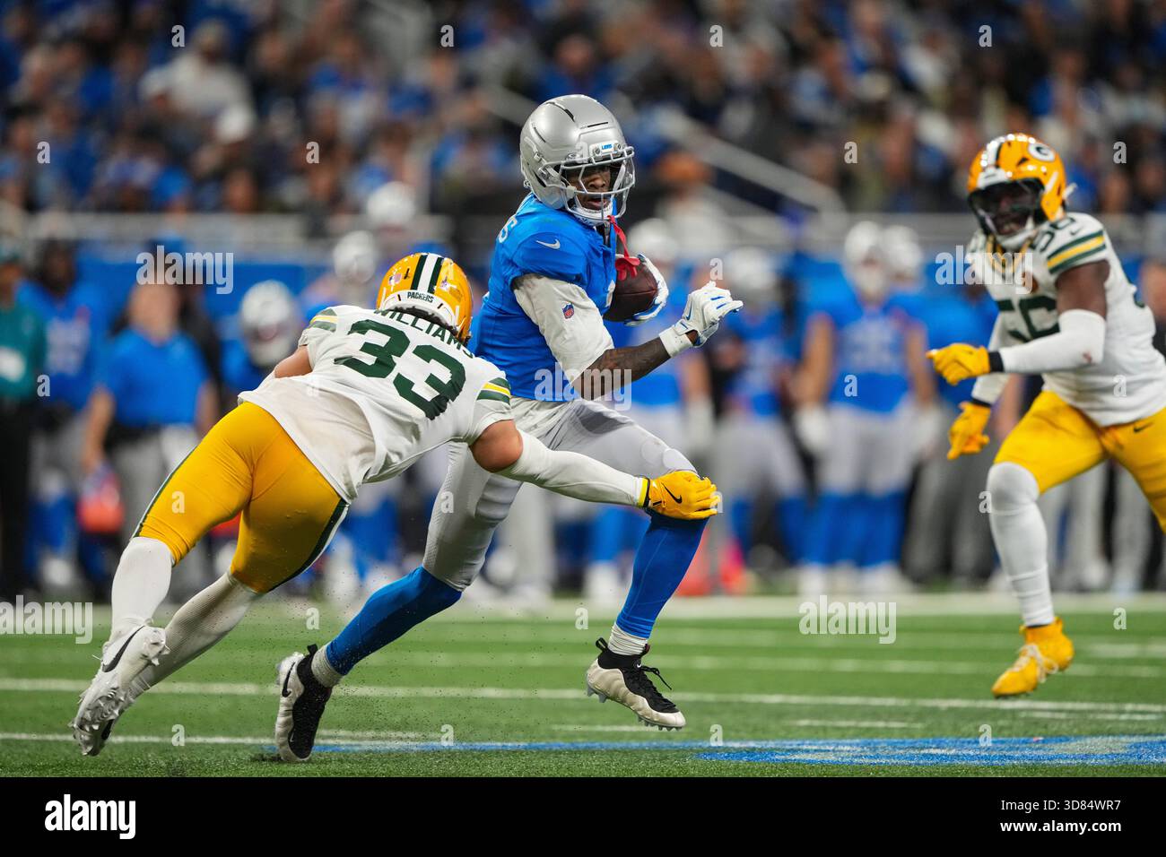 Detroit Lions wide receiver Jameson Williams (1) tries to get past ...