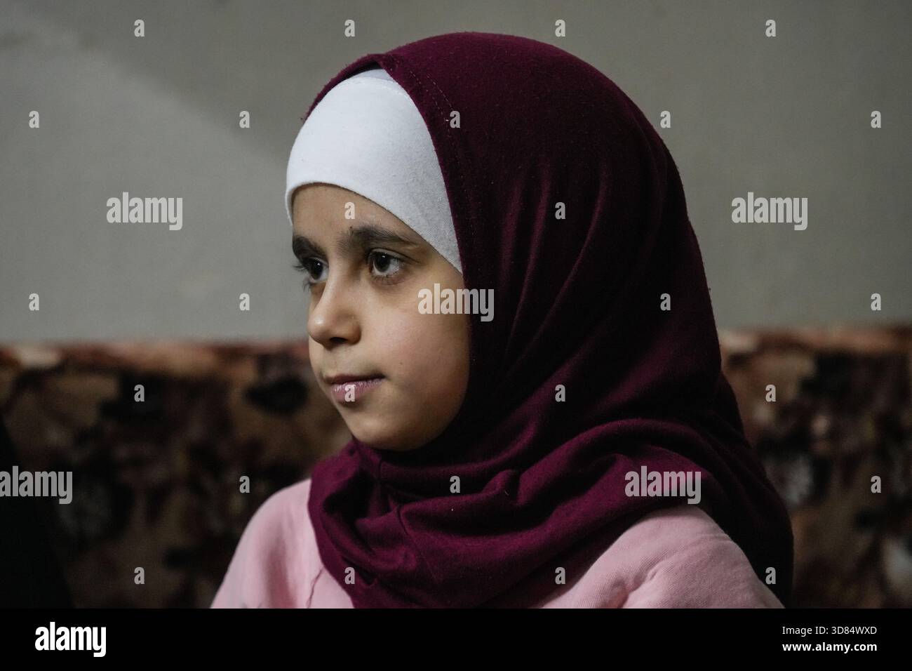 22 November 2025, Syria, Aleppo: Maria the youngest daughter of Hiba ...