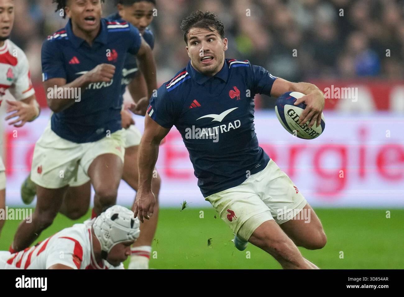 FILE - France's Antoine Dupont makes a break during the Autumn Nations ...