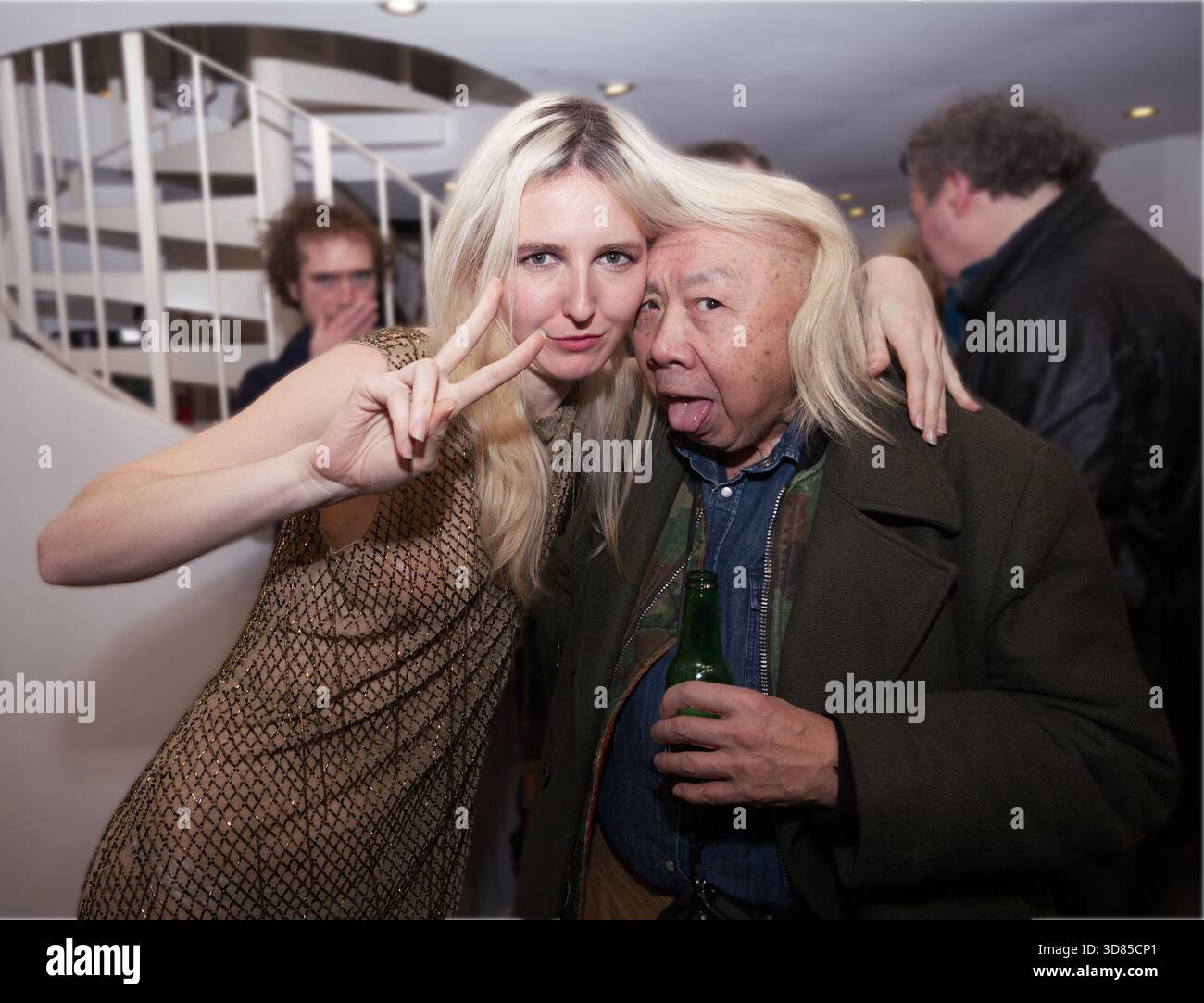 Paris, France. 27th Nov, 2025. Julie Gintowt-Dziewaltowski and french photographer Foc Kan pose ...