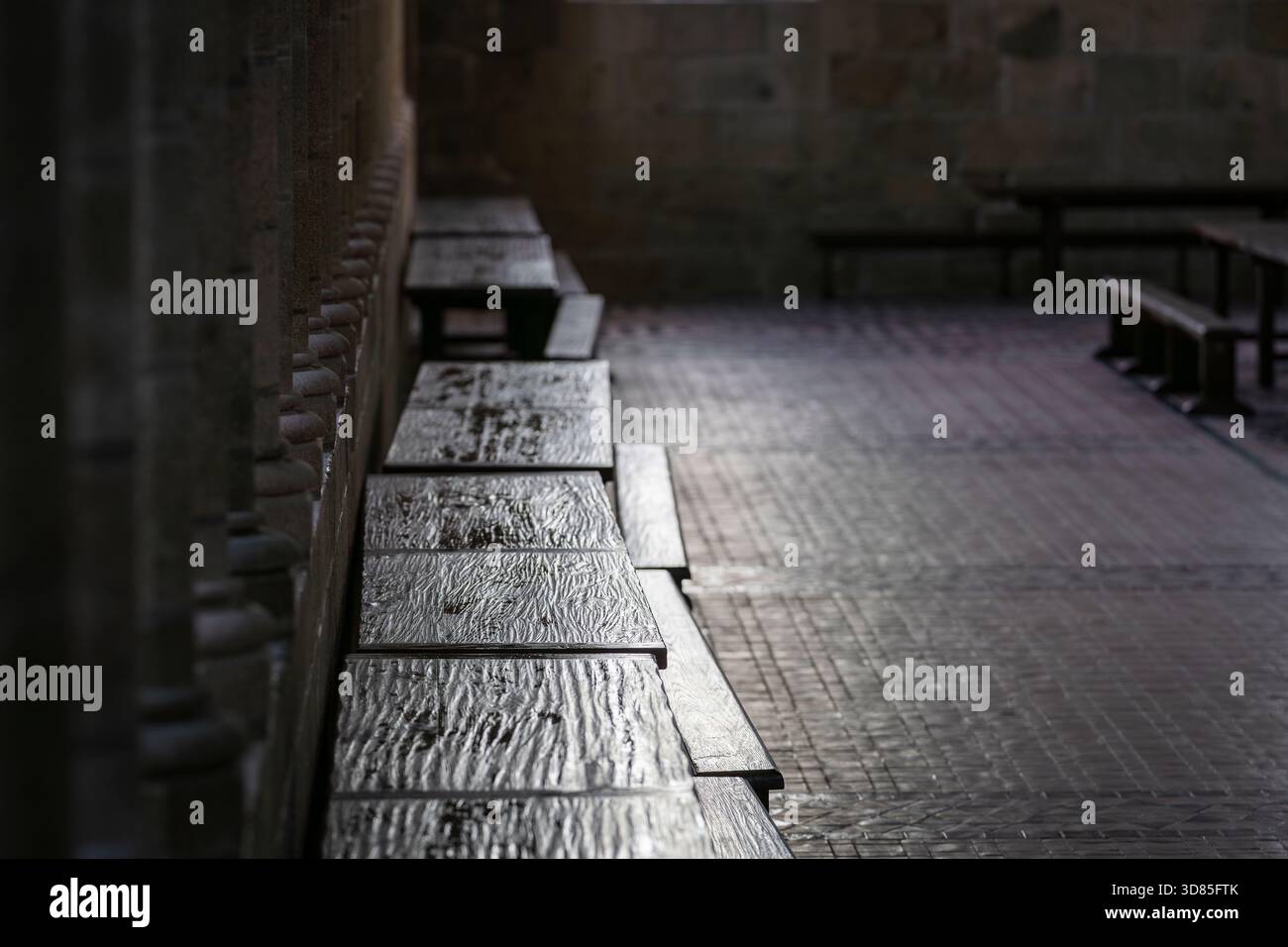 Ancient wooden benches in the medieval refectory of Mont Saint-Michel ...