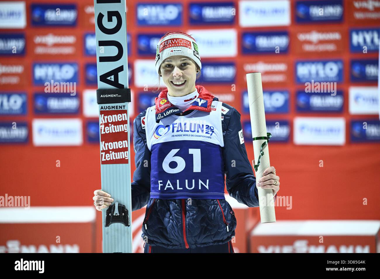 Third placed Lisa Eder of Austria poses on the podium following the ...