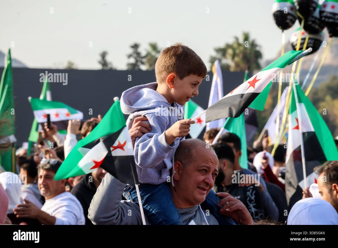 Thousands of Syrians gather in Umayyad Square in central Damascus to ...