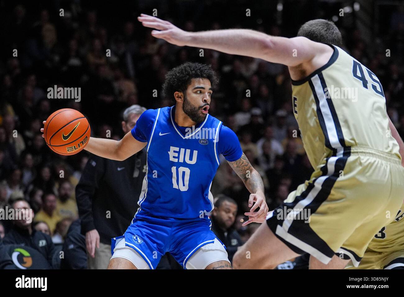 Purdue center Oscar Cluff (45) defends Eastern Illinois guard Preston ...