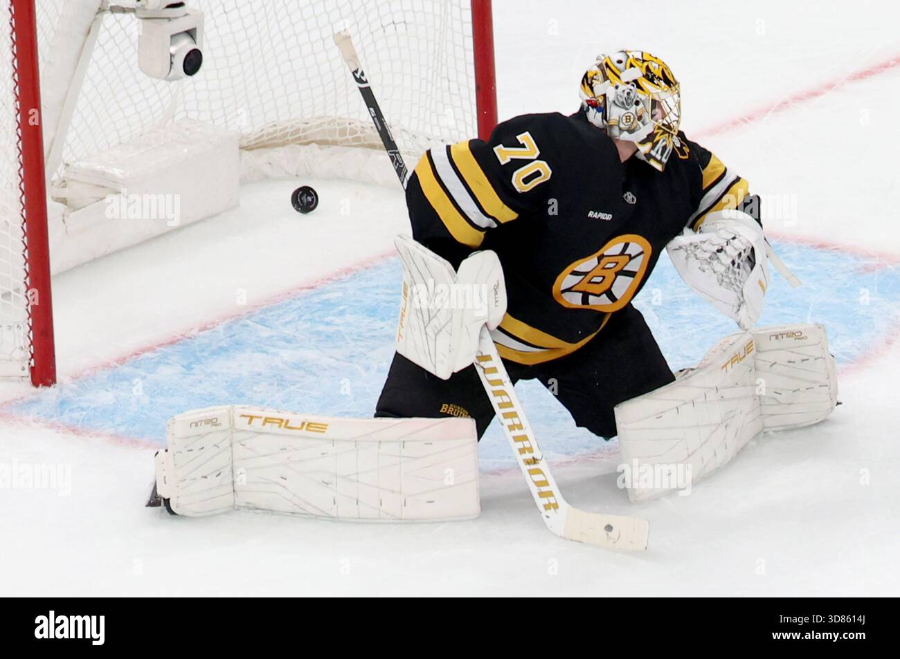Boston Bruins goaltender Joonas Korpisalo (70) fails to block the puck ...