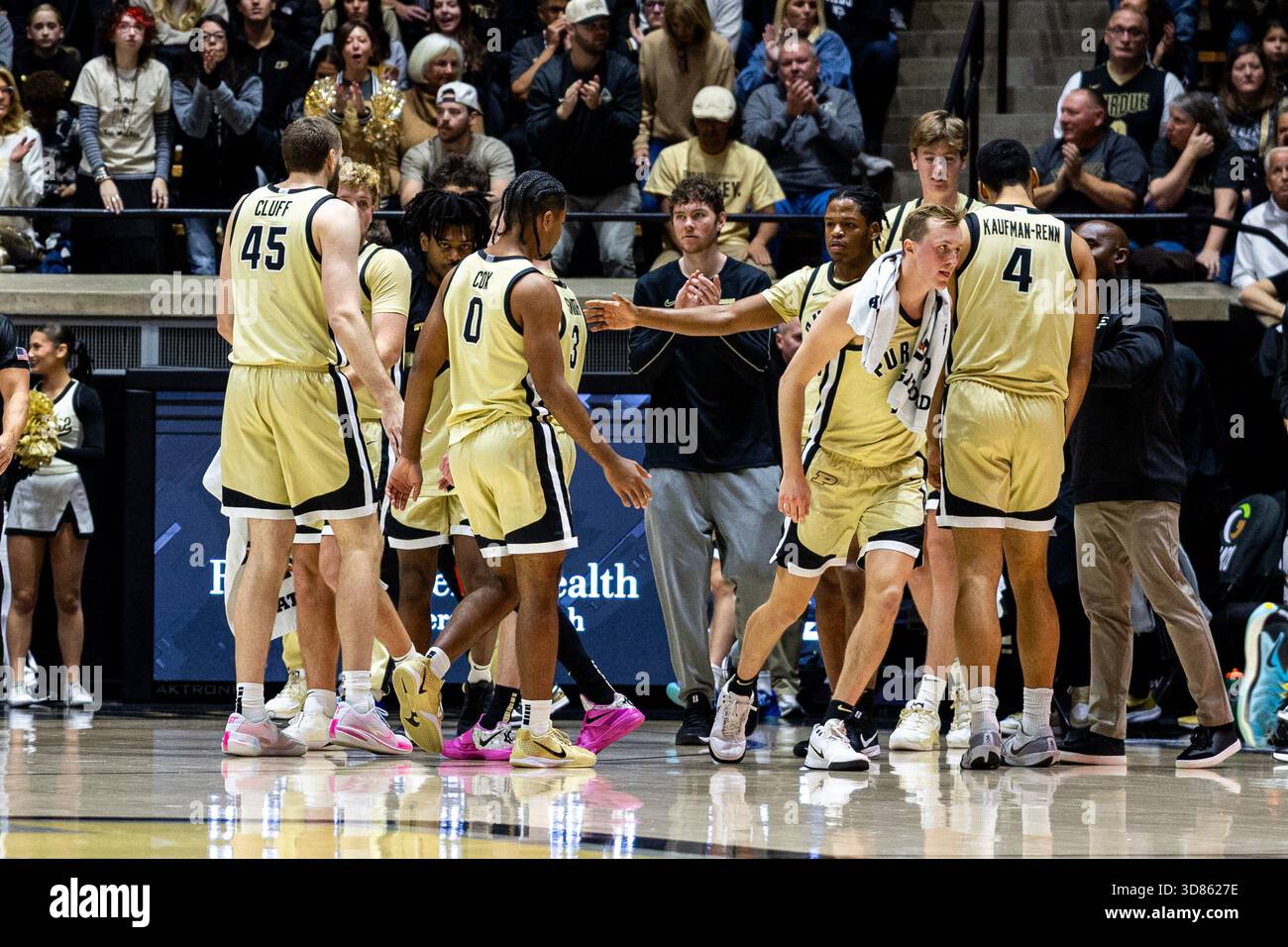 November 28, 2025: Purdue players react to made basket during NCAA ...