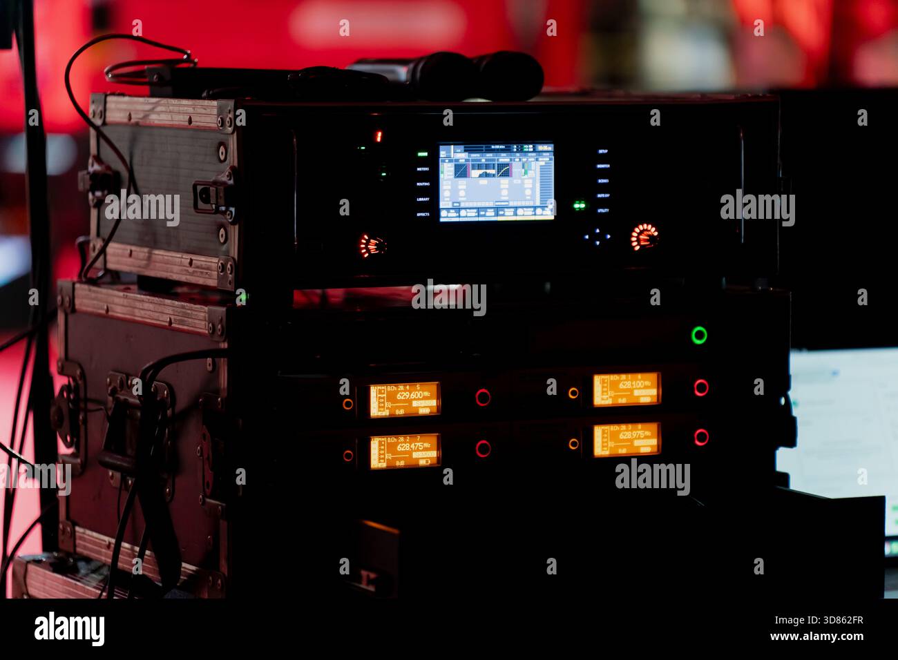 Stage production rack containing multiple electronic devices with ...
