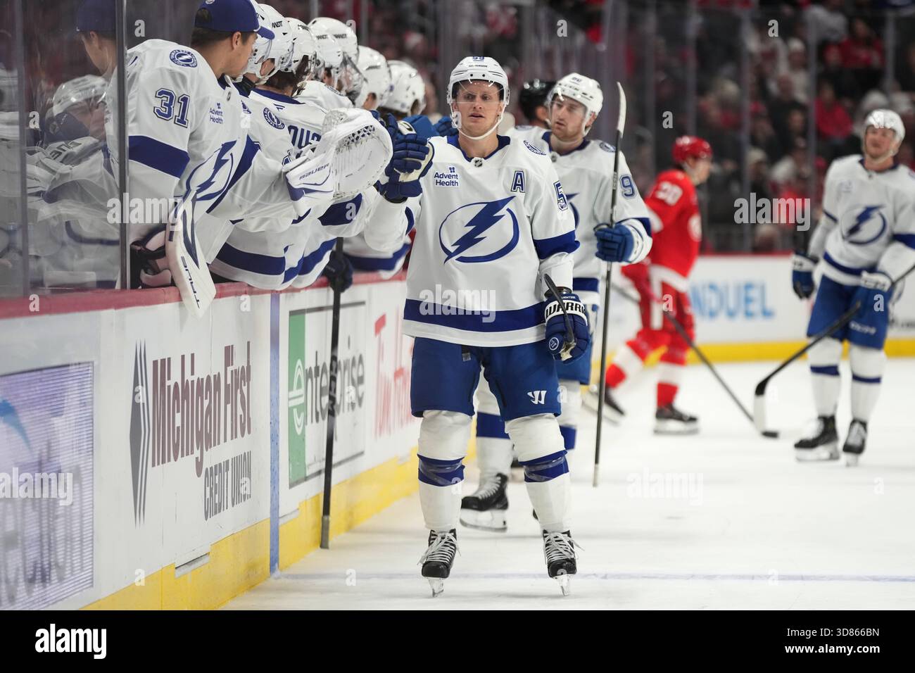Tampa Bay Lightning center Jake Guentzel celebrates with the bench ...