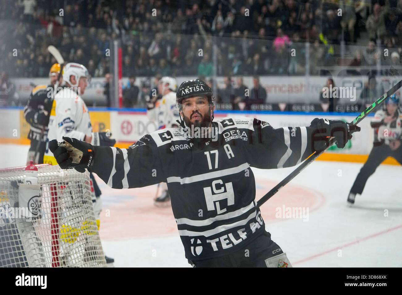 PORZA, SWITZERLAND - NOVEMBER 28: Luca Fazzini of Lugano celebrates his ...