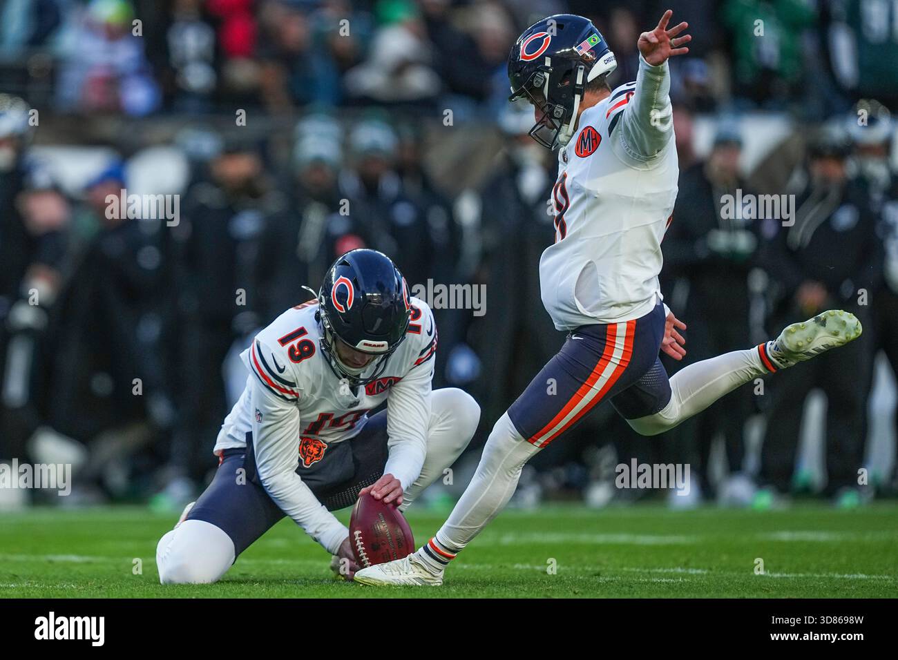 Chicago Bears place kicker Cairo Santos (8) kicks the extra point during the first half of an ...