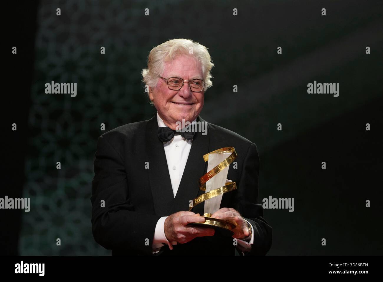 Egyptian actor Hussein Fahmy receives a recognition during the 22nd Marrakech Film Festival, in ...