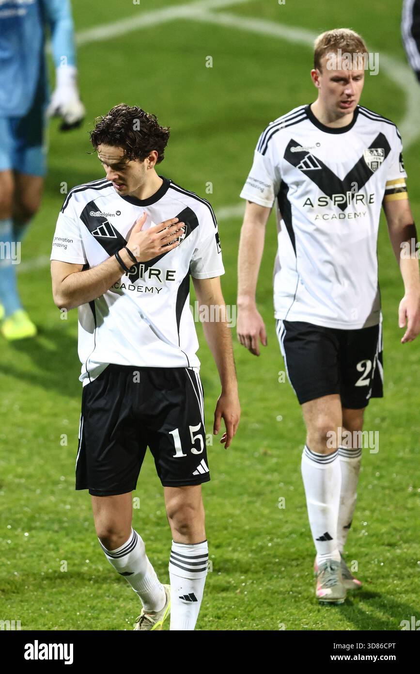 Eupen's players look dejected after a soccer game between KAS Eupen and ...