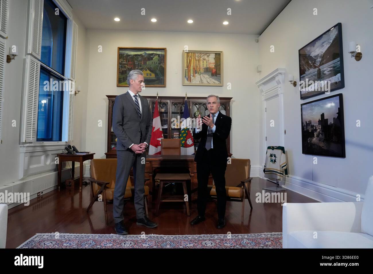 Prime Minister Mark Carney, right, is seen with Northwest Territories ...