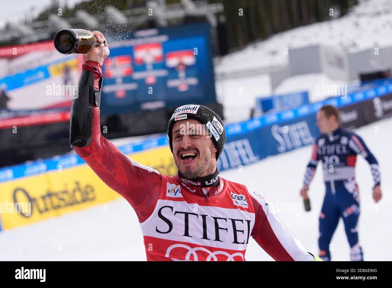 First place finisher Austria's Stefan Brennsteiner celebrates after a ...